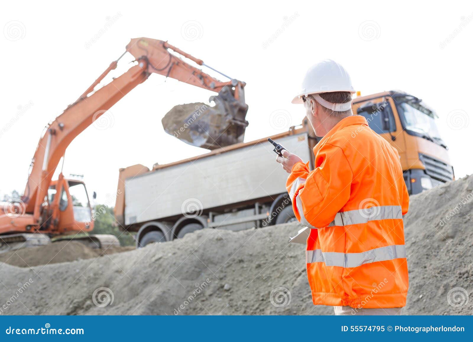 Side View of Architect Using Walkie-talkie while Working at ...