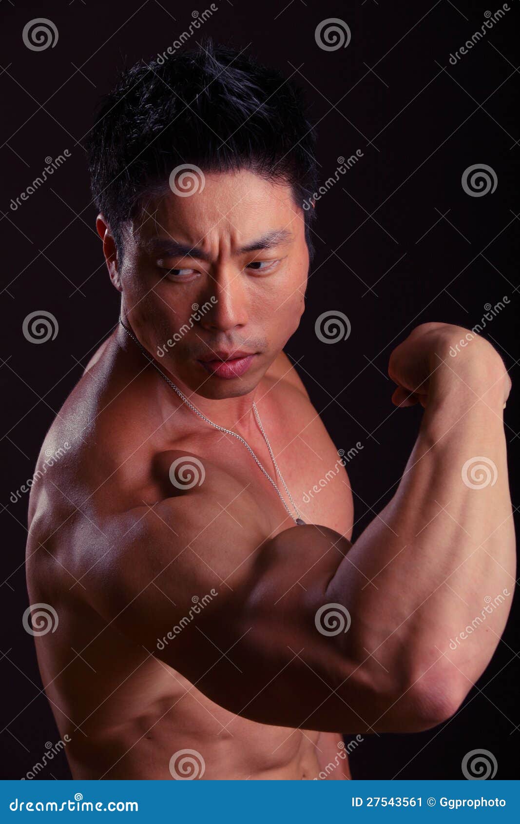 Side View Of Asian Body Builder Flexing Bicep Stock Image Image Of