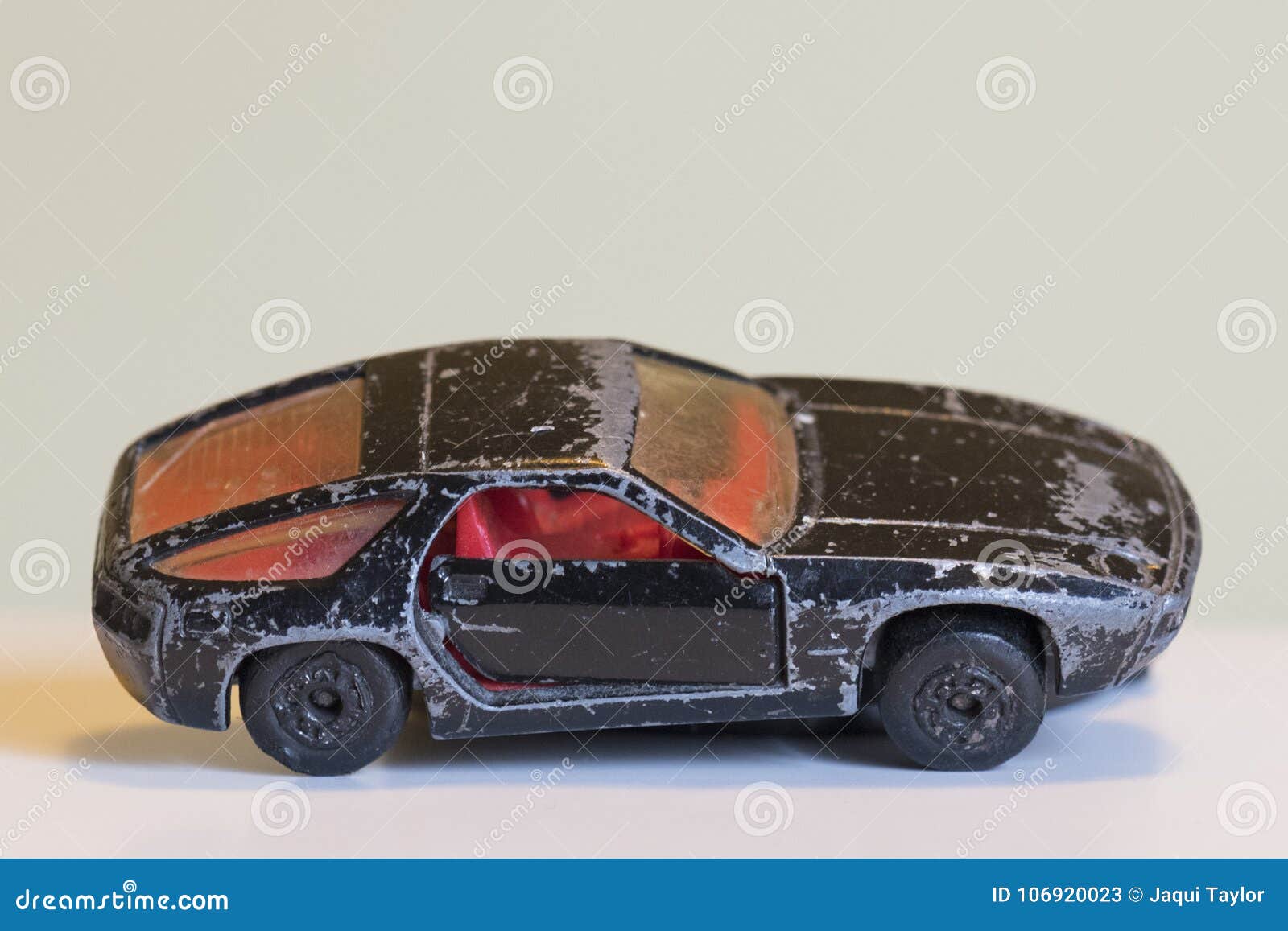 A battered black toy car stock image. Image of scrached - 106920023
