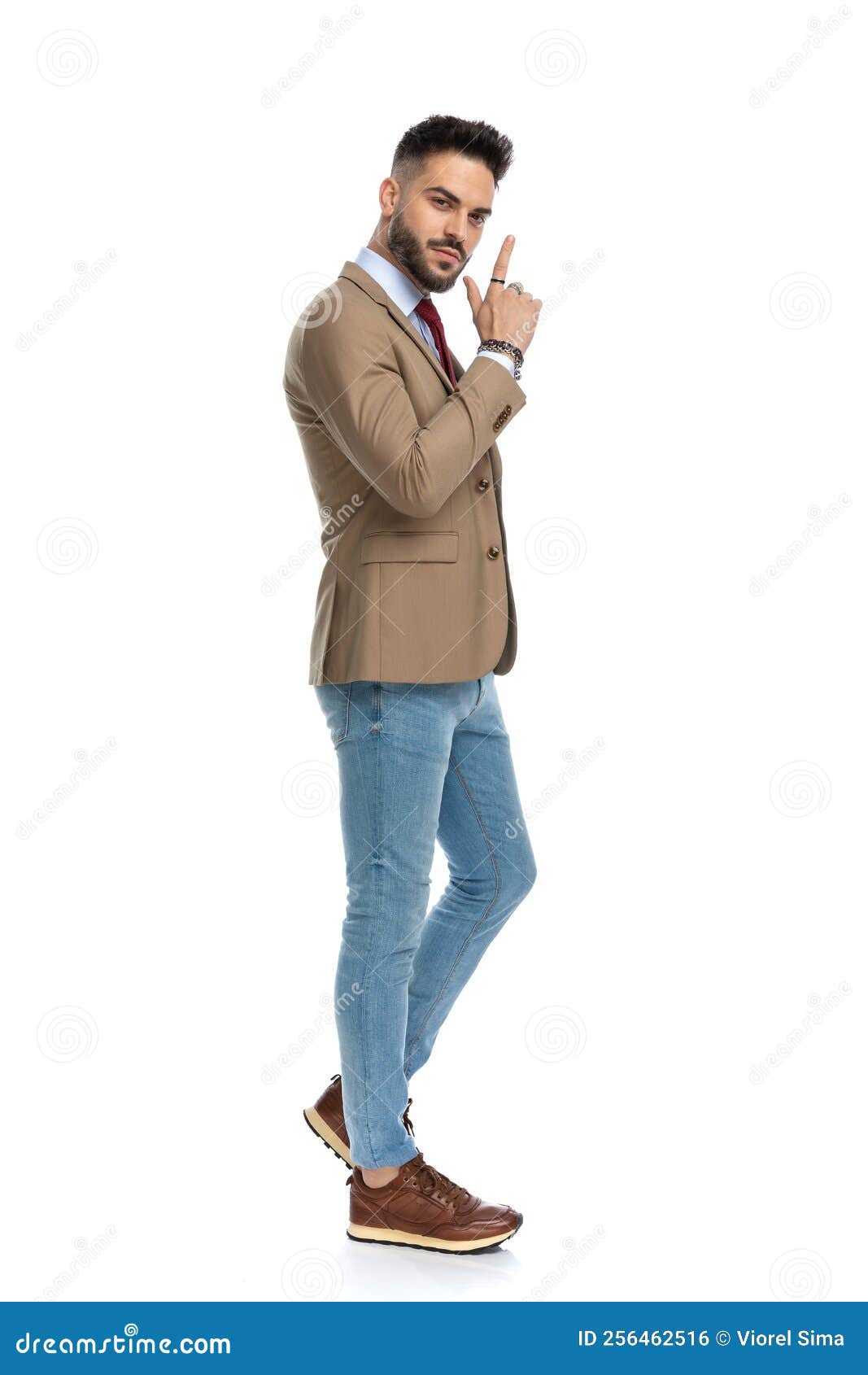 Side View of Bearded Man in Blue Jeans Pointing Finger in the Air Stock ... Side View of Bearded Man in Blue Jeans Pointing Finger in the Air Stock ...