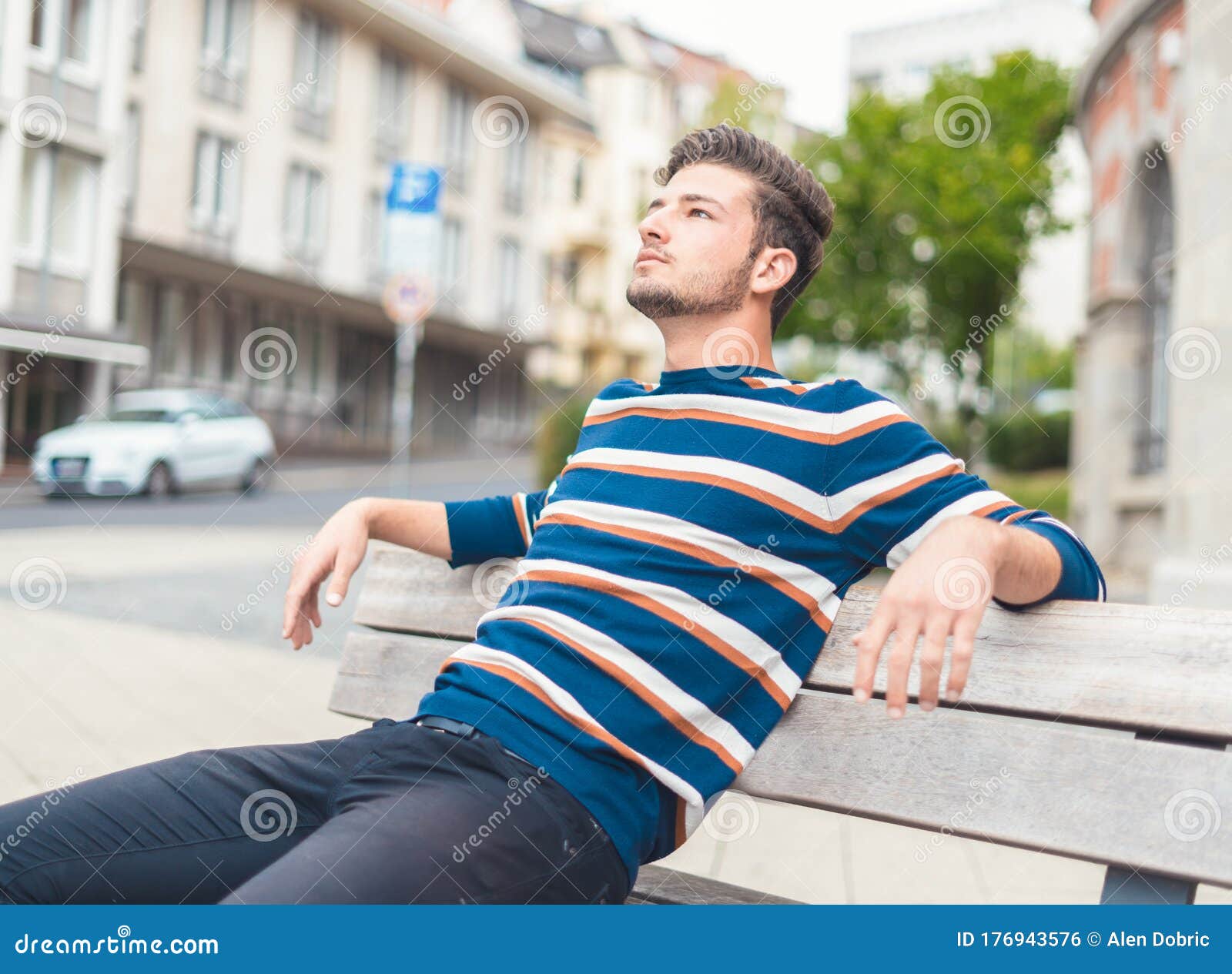 Person Sitting On Bench Side View