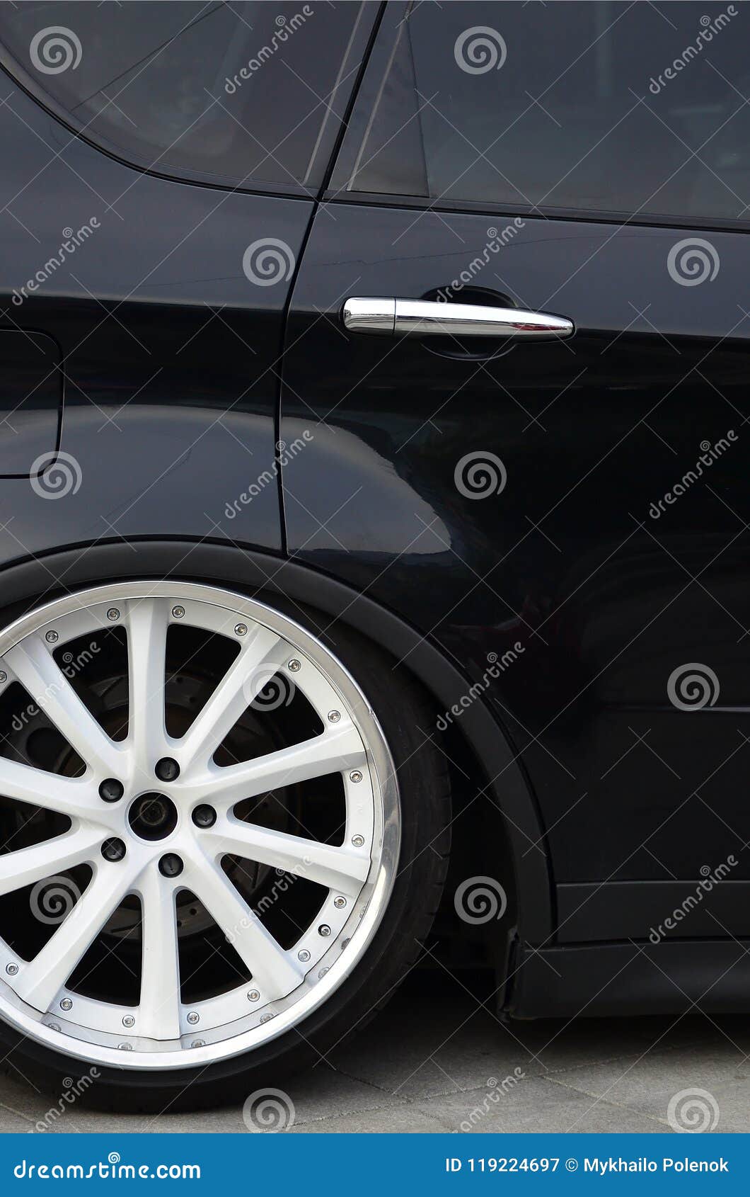 Side View of a Black Glossy Car with White Wheels Stock Image - Image ...
