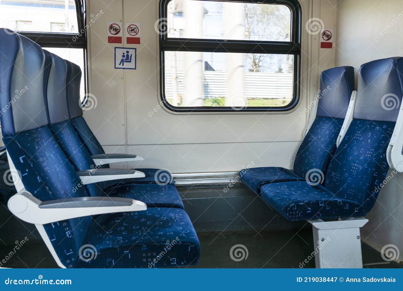 Side View of Blue Armchairs in Empty Train in Row of Three, No People ...