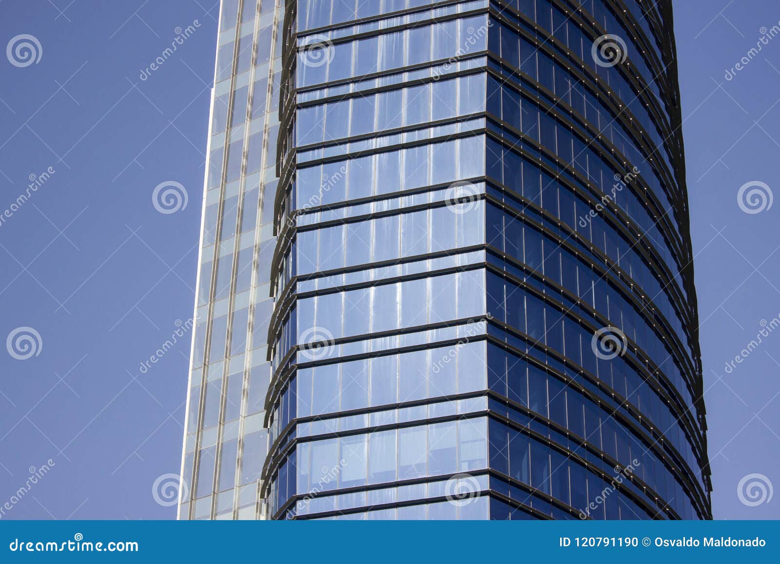 Side View of a Blue Modern Corporate Building Composed of Two High-rise ...