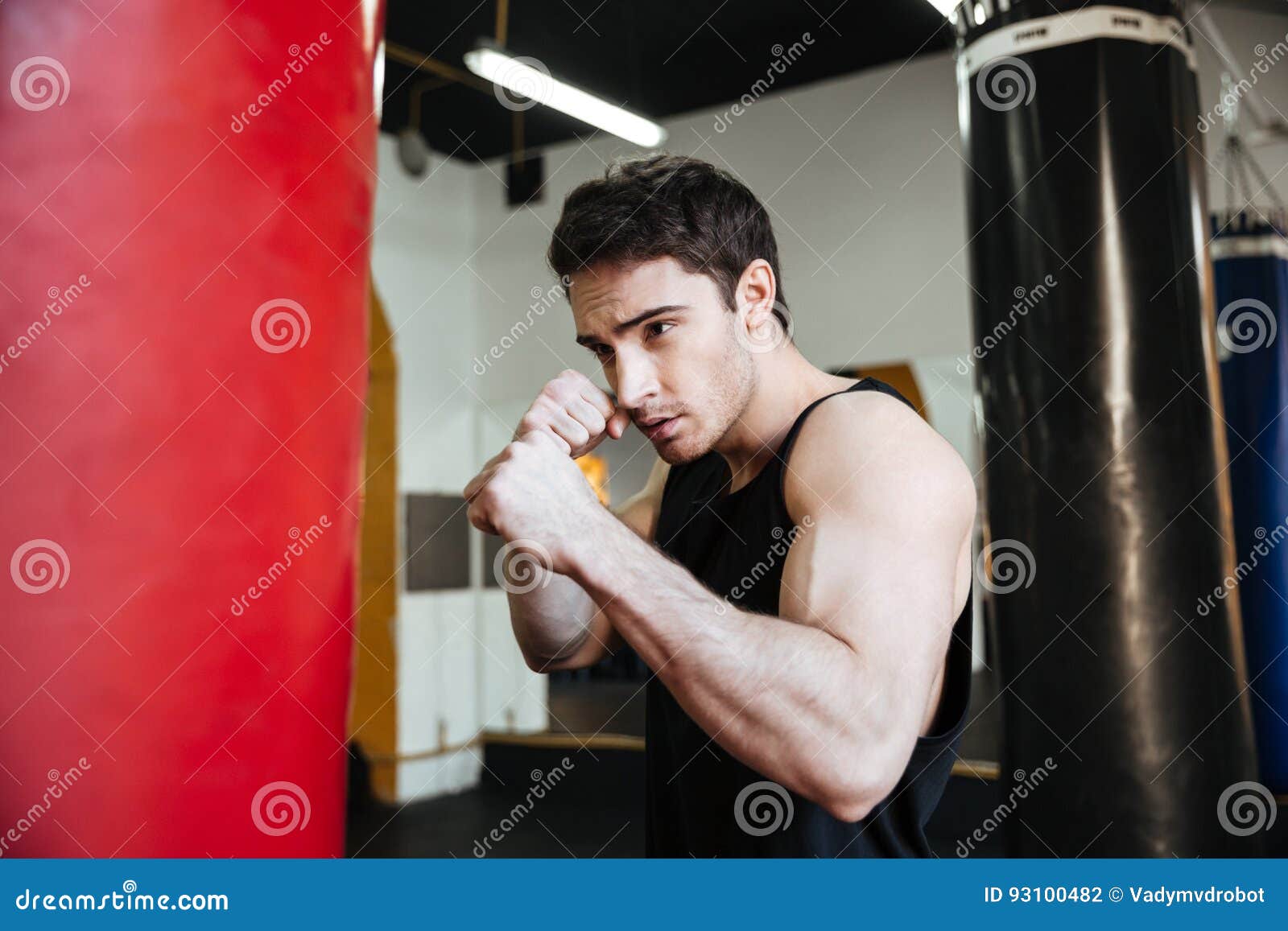 Side View of Boxer Training with Punchbag Stock Photo - Image of ...