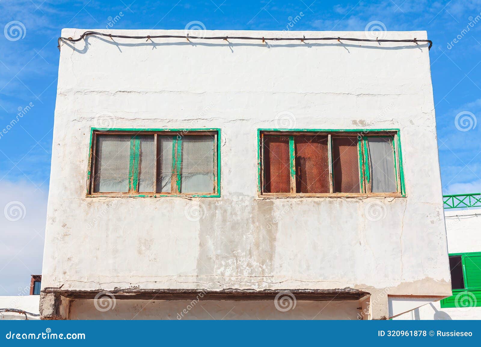 Side View of Building with Green Windows Stock Photo - Image of wood ...