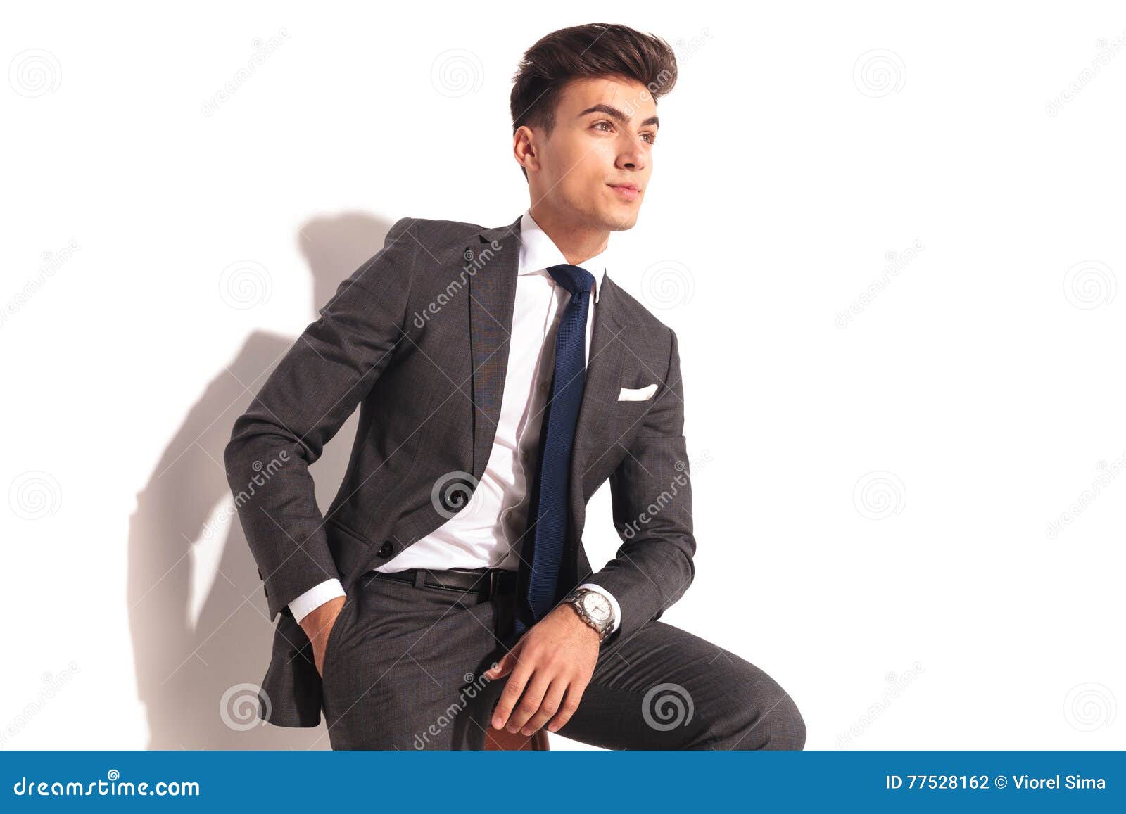 Side View of a Business Man Sitting and Looking Away Stock Photo ...