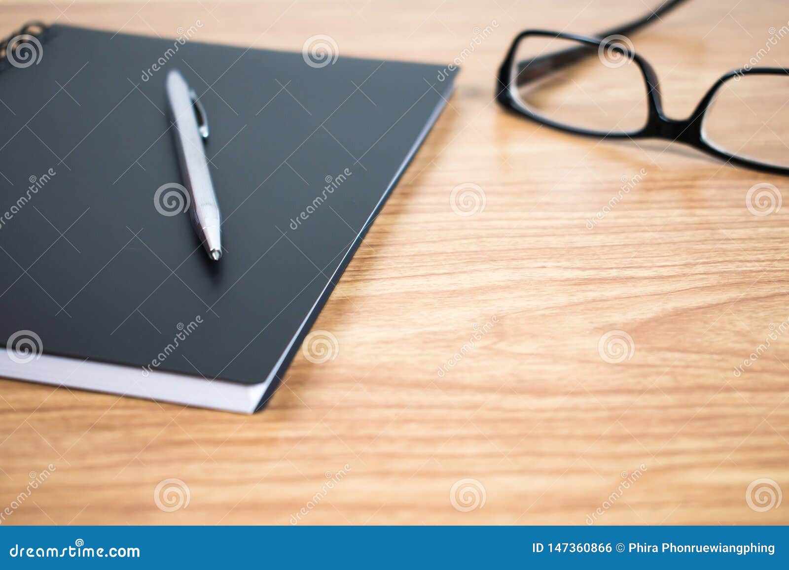 Side View of a Pen and Notebook at the Ready on the Table. Close Up ...