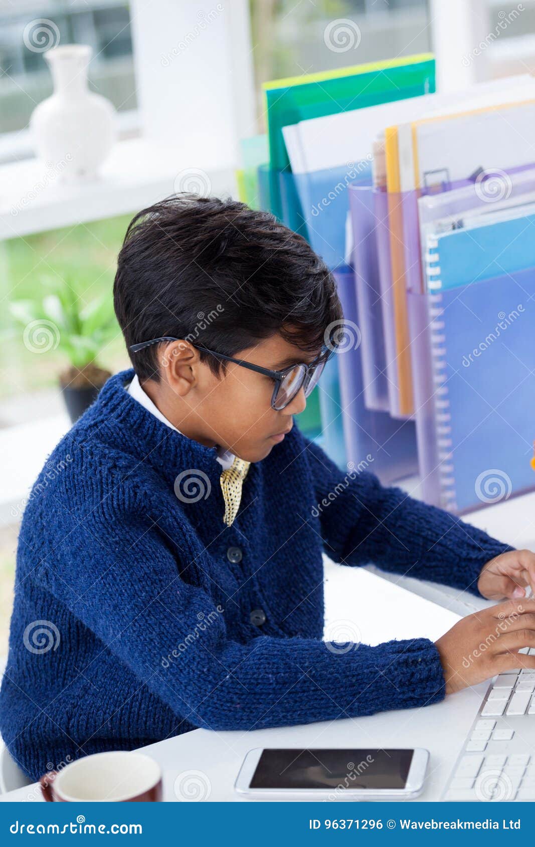 Side View of Businessman Using Desktop Computer at Desk Stock Photo ...