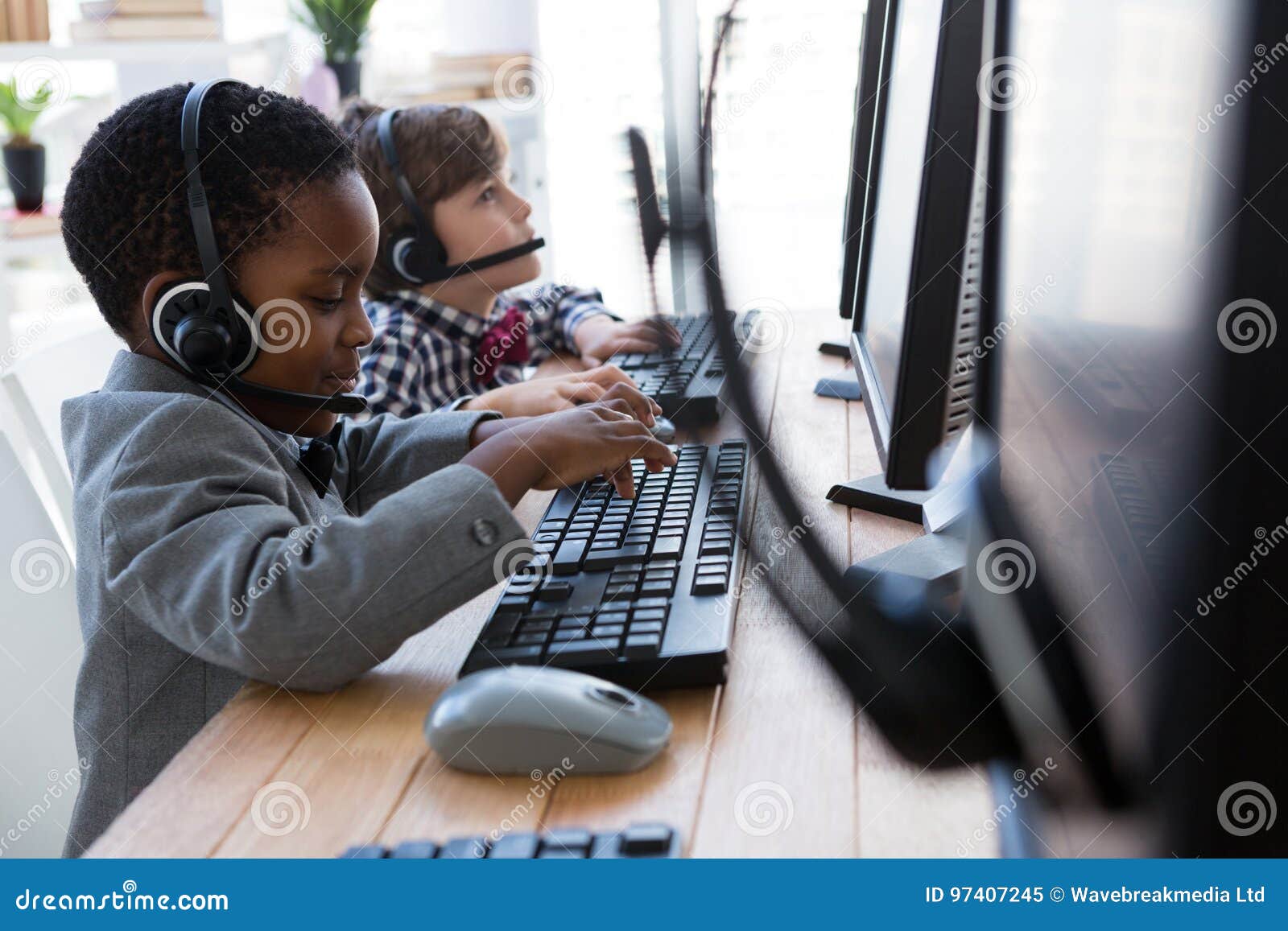 Side View of Businessmen Using Computer at Desk Stock Image - Image of ...