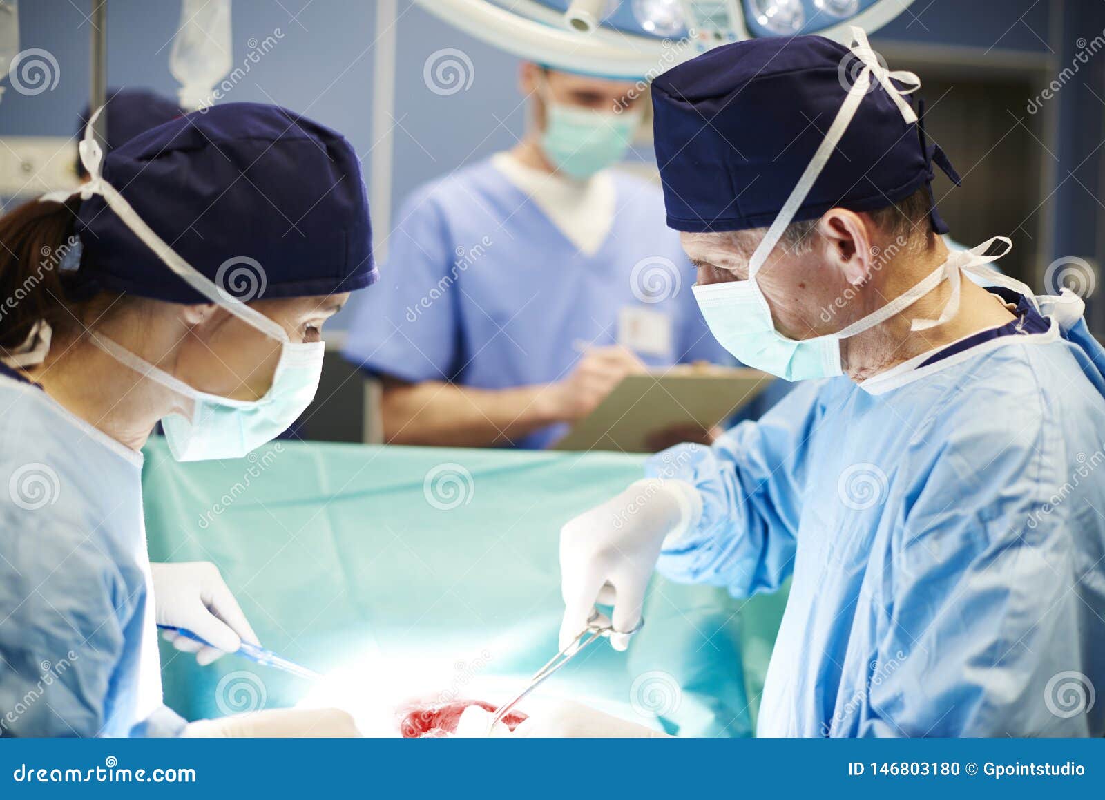Busy Surgeons Over the Operating Table Stock Photo - Image of side ...