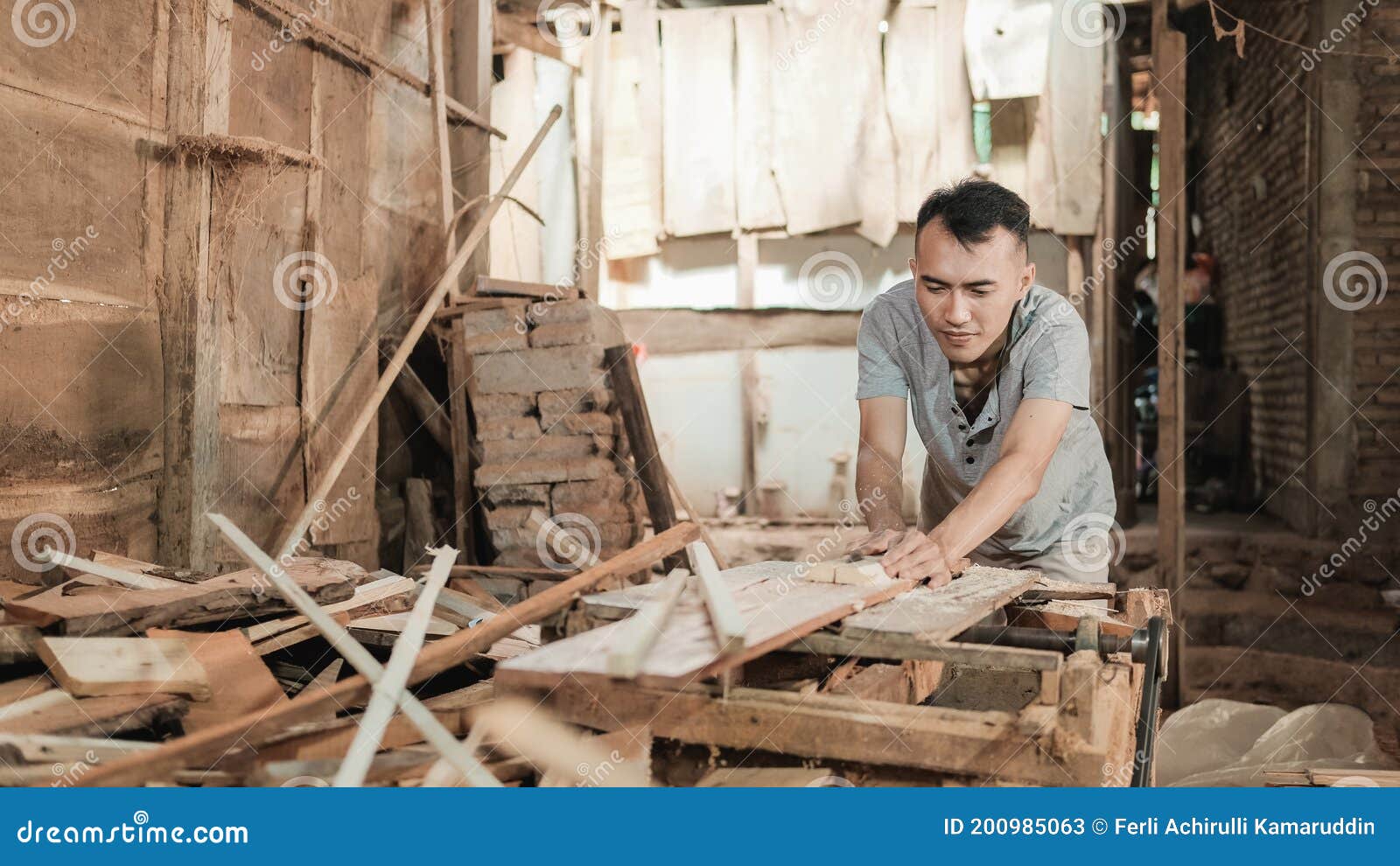 Side View Carpenter Cutting Wood Planks Using a Circle Saw Stock Image ...