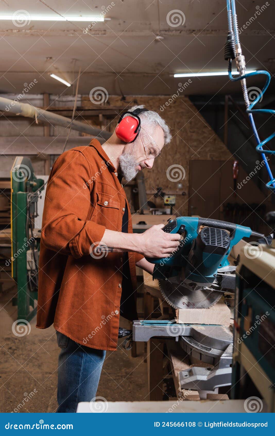 Side View of Carpenter in Protective Stock Photo - Image of woodworker ...