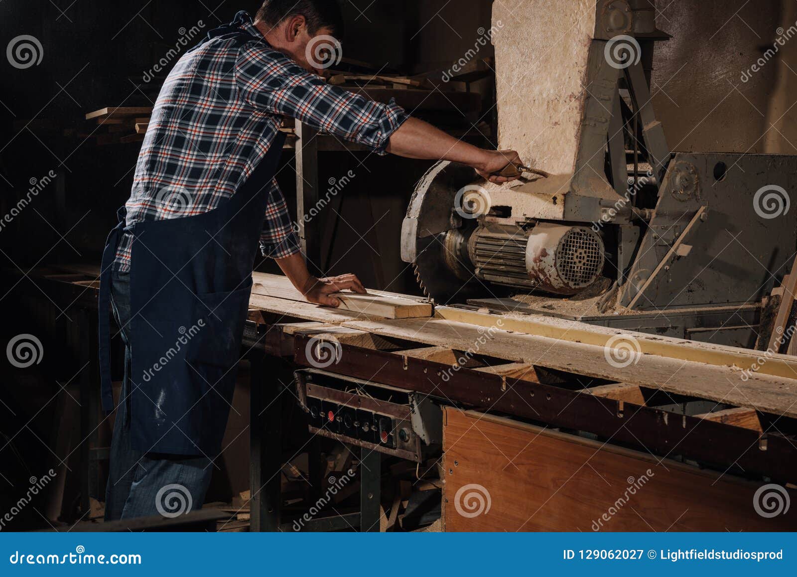 Side View of Carpenter Using Saw Stock Image - Image of joiner, laborer ...