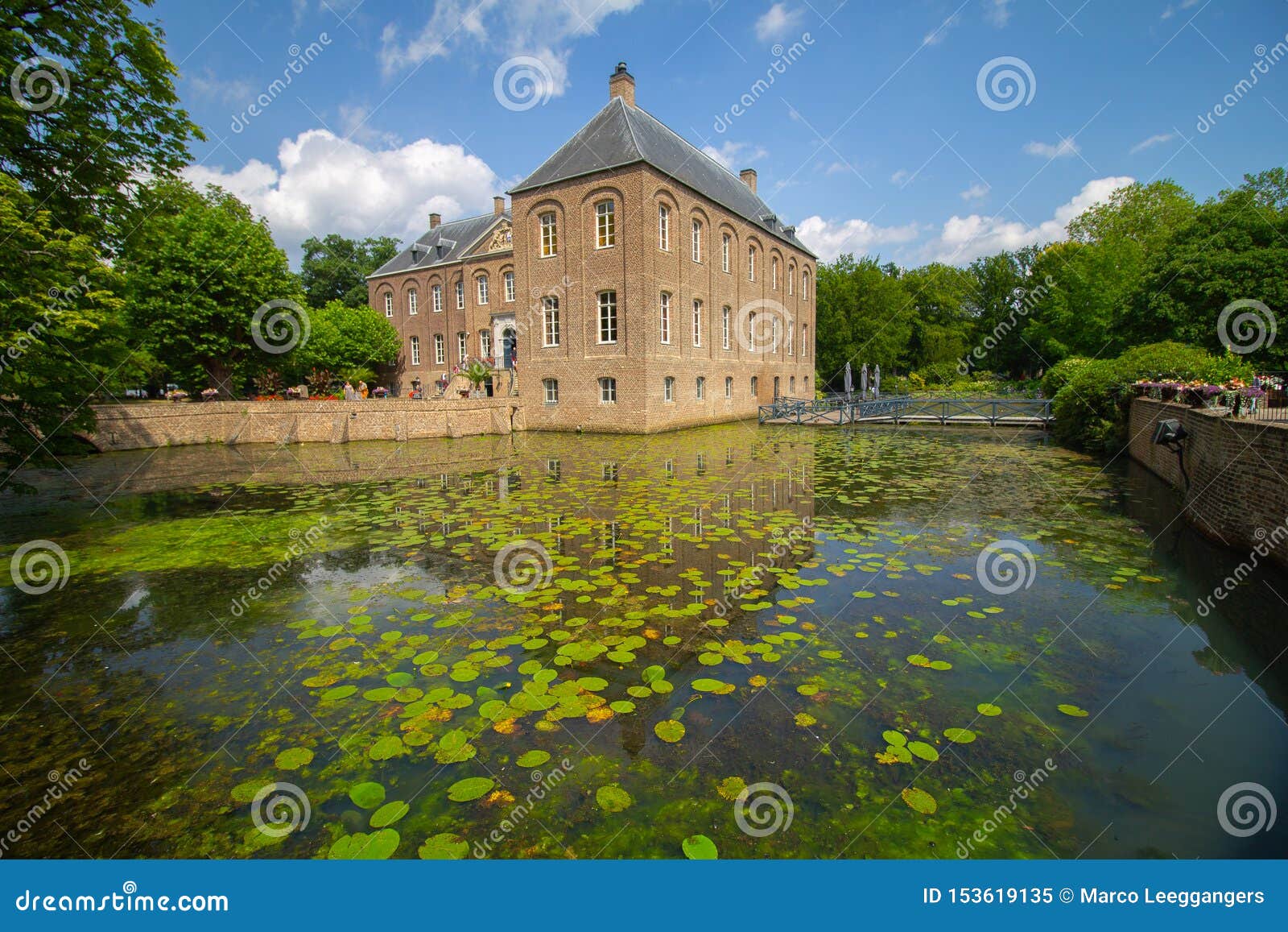 Side View from Castle Arcen Reflective in Water with Lelies Stock Image ...