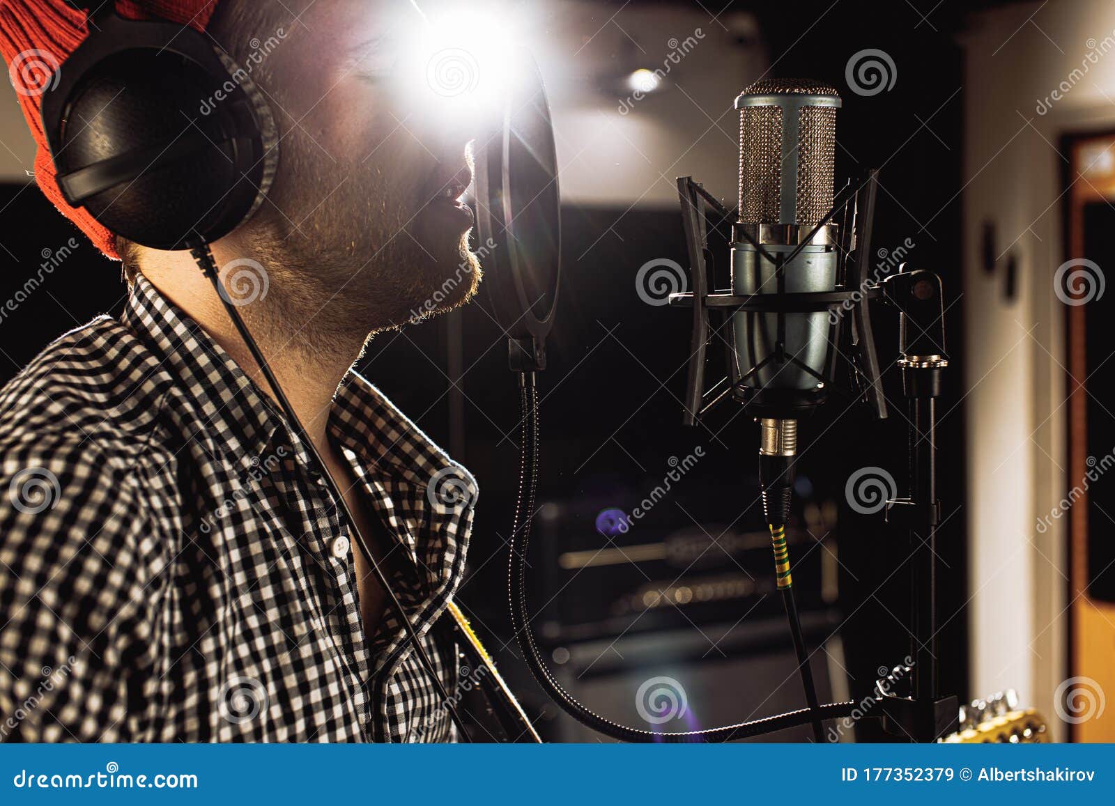Side View on Caucasian Young Man Singing in Studio Stock Image - Image ...