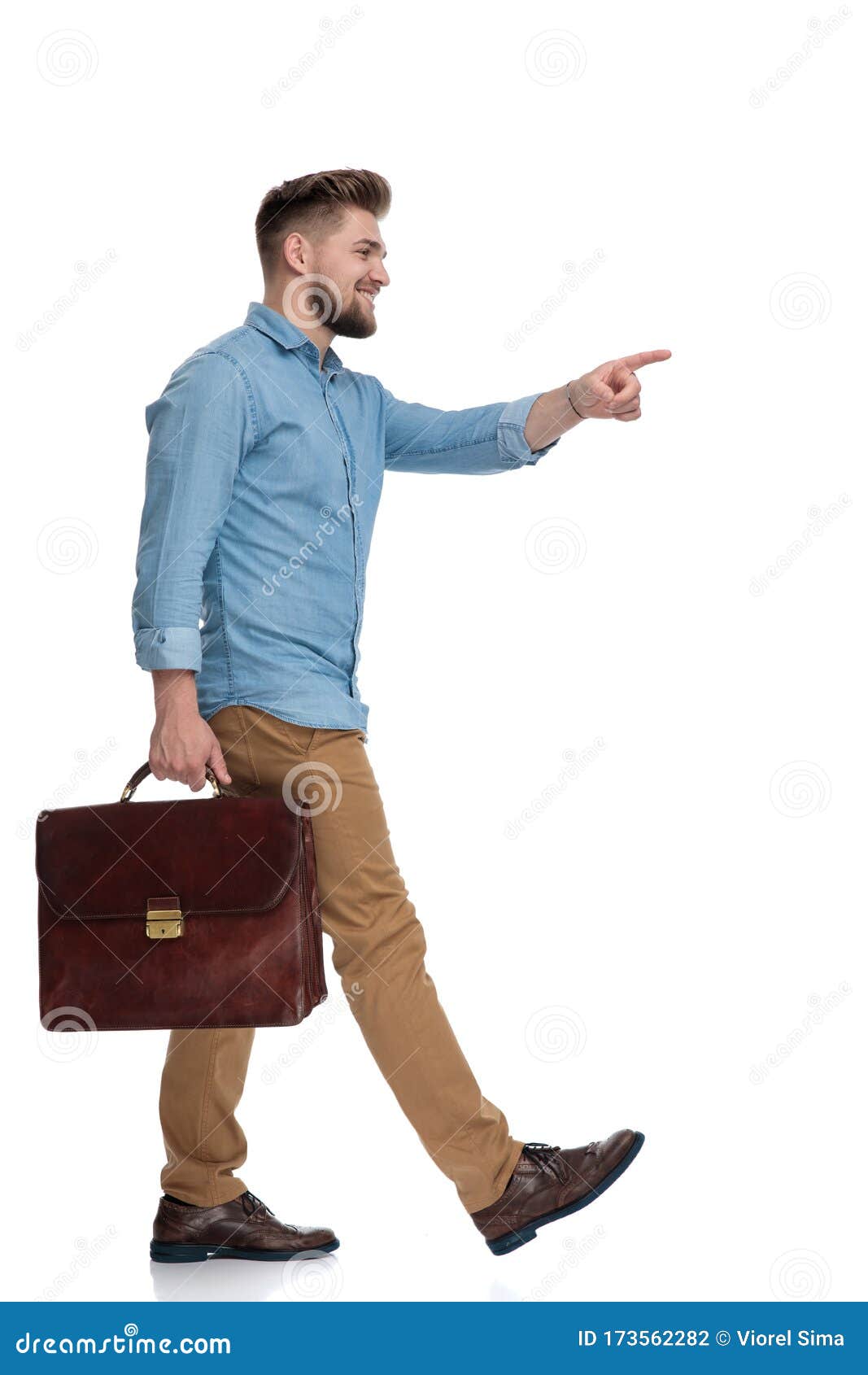 Side View of a Cheerful Casual Man Pointing Stock Photo - Image of ... Side View of a Cheerful Casual Man Pointing Stock Photo - Image of ...