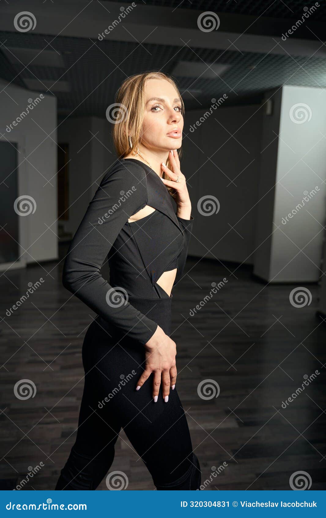 Female Dancer Posing for Camera while Doing Choreography in Studio ...