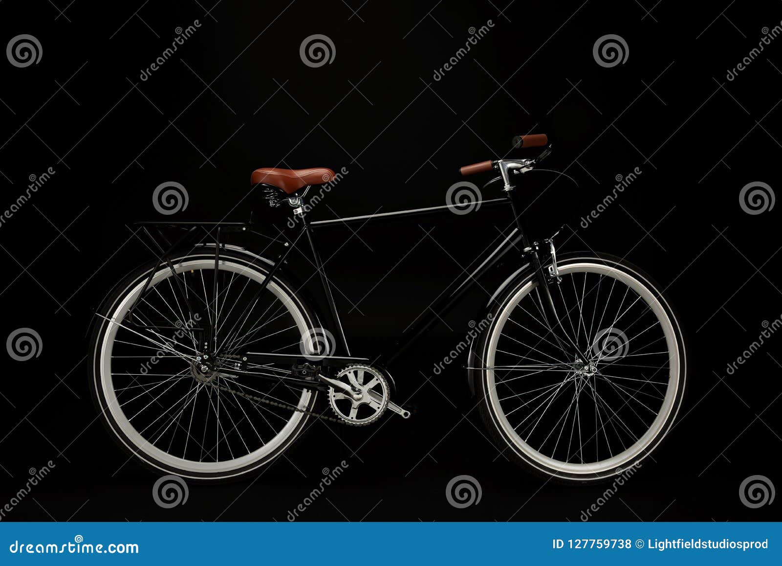 Side View of Classic Vintage Bicycle Isolated on Black Stock Photo ...