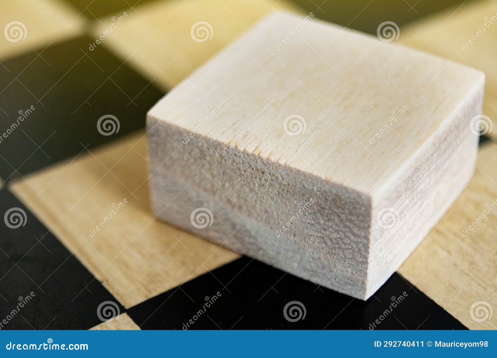 Side View Closeup of Wooden Cube on Empty Chess Board. Stock Image ...