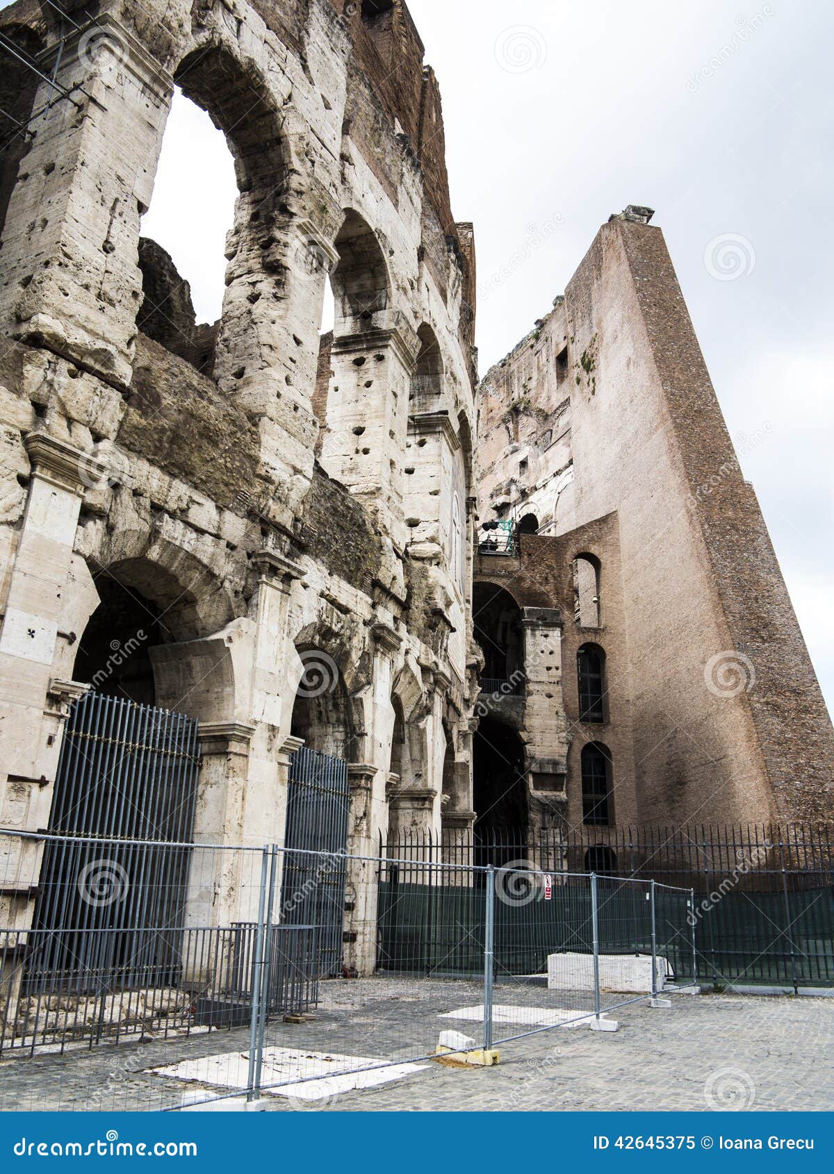 Side view of the Colosseum stock image. Image of tourists - 42645375
