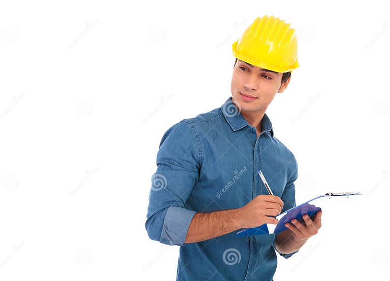 Side View of a Construction Engineering Student Writing on Clipboard ...