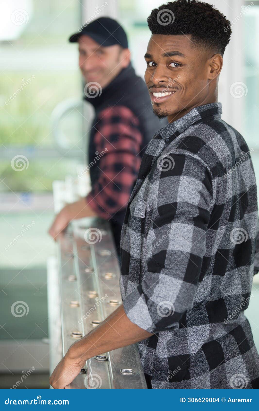 Side View Construction Workers Carrying Ladder Together Stock Photo ...