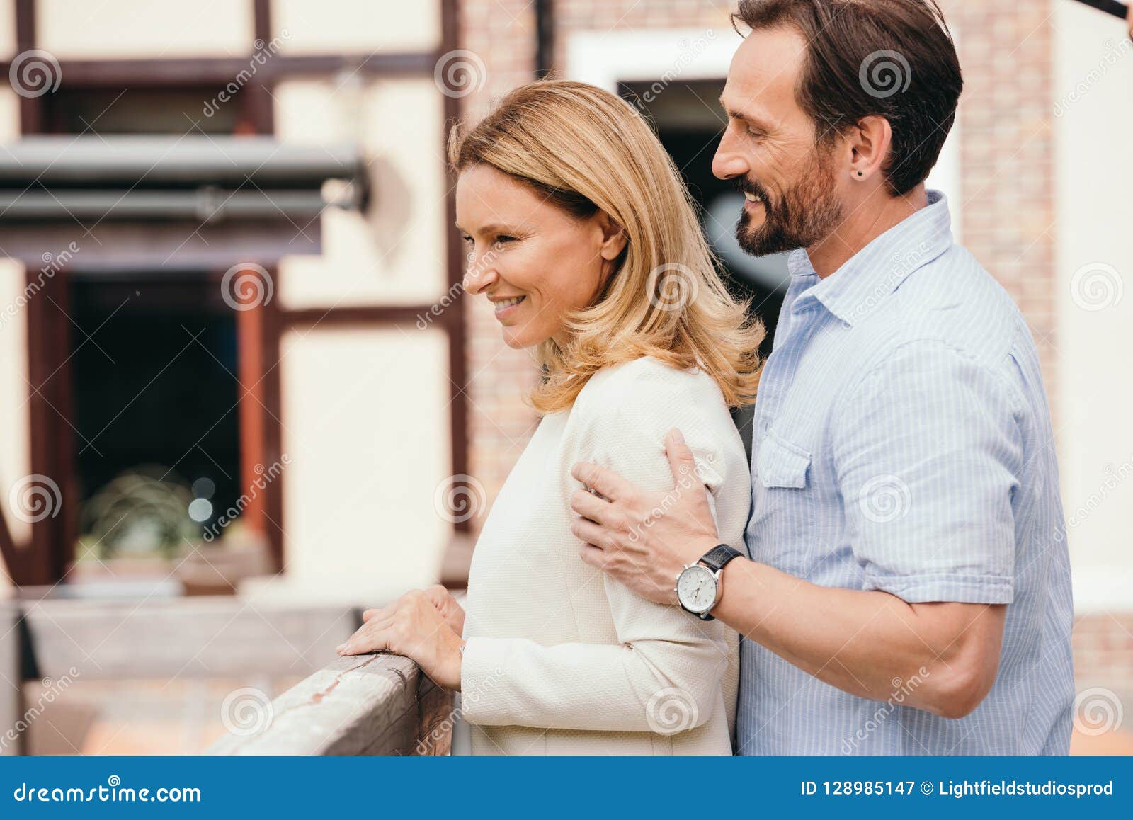 Side View of Couple Hugging Stock Image - Image of street, people ...