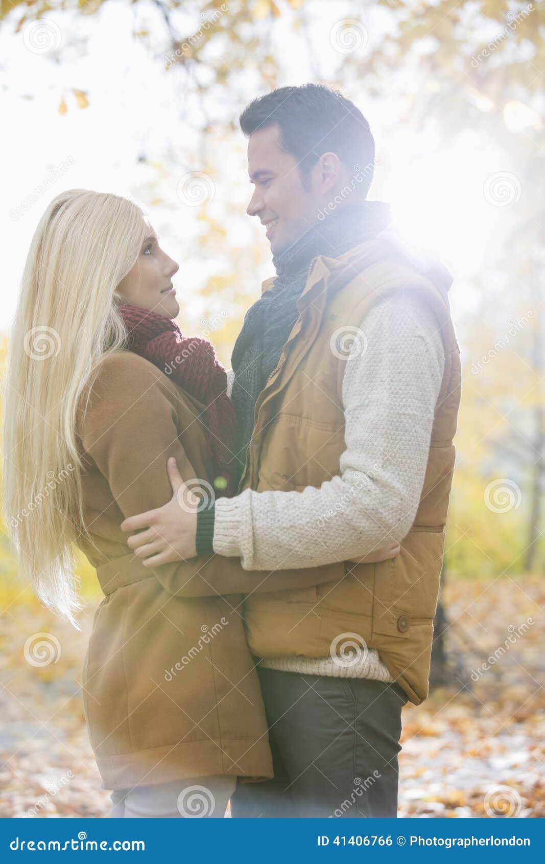 Side View of Couple Hugging in Park Stock Photo - Image of lifestyle ...