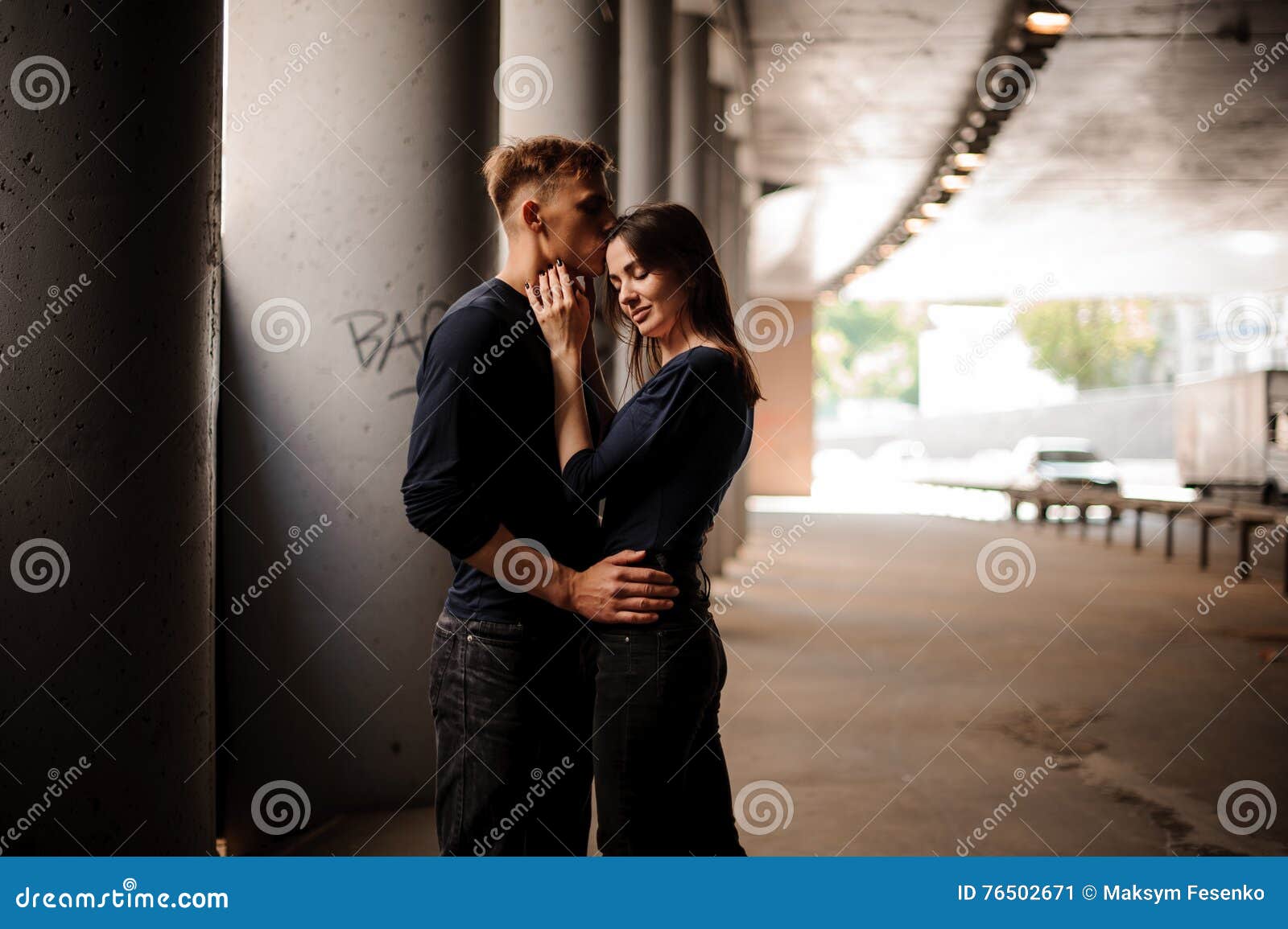Side View of Couple Standing and Hugging Stock Image - Image of couple ...