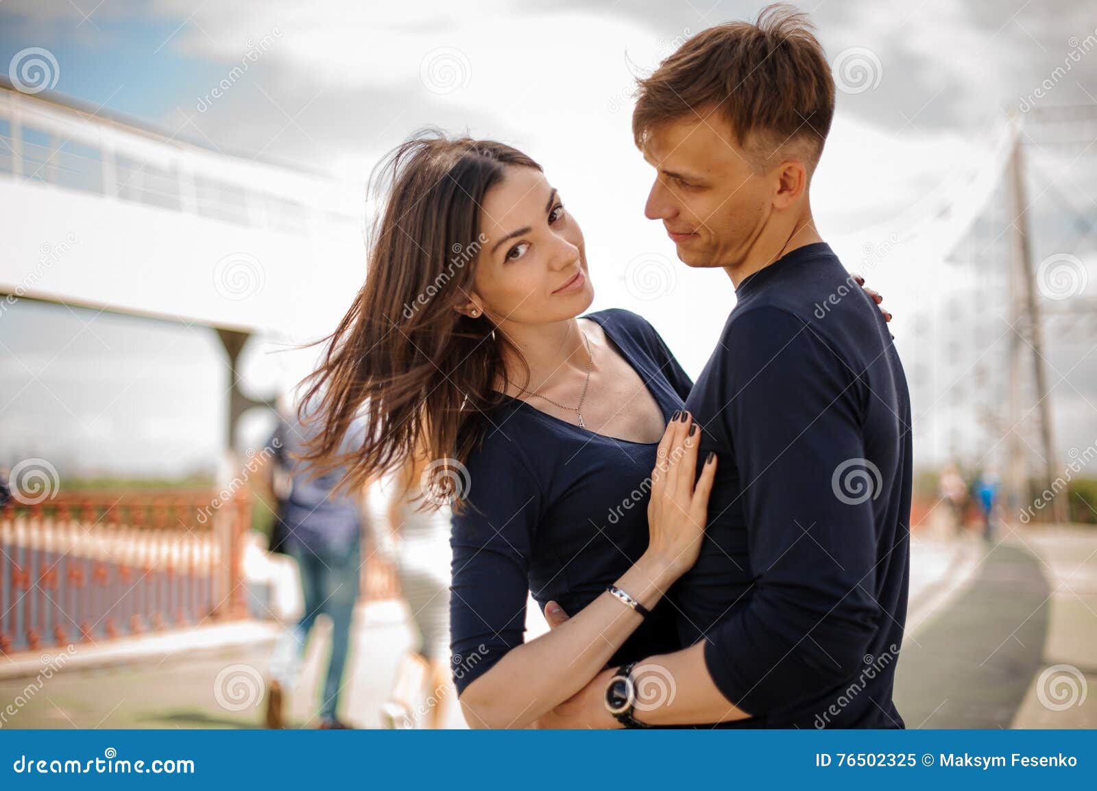 Side View of a Couple Standing and Hugging Stock Image - Image of ...