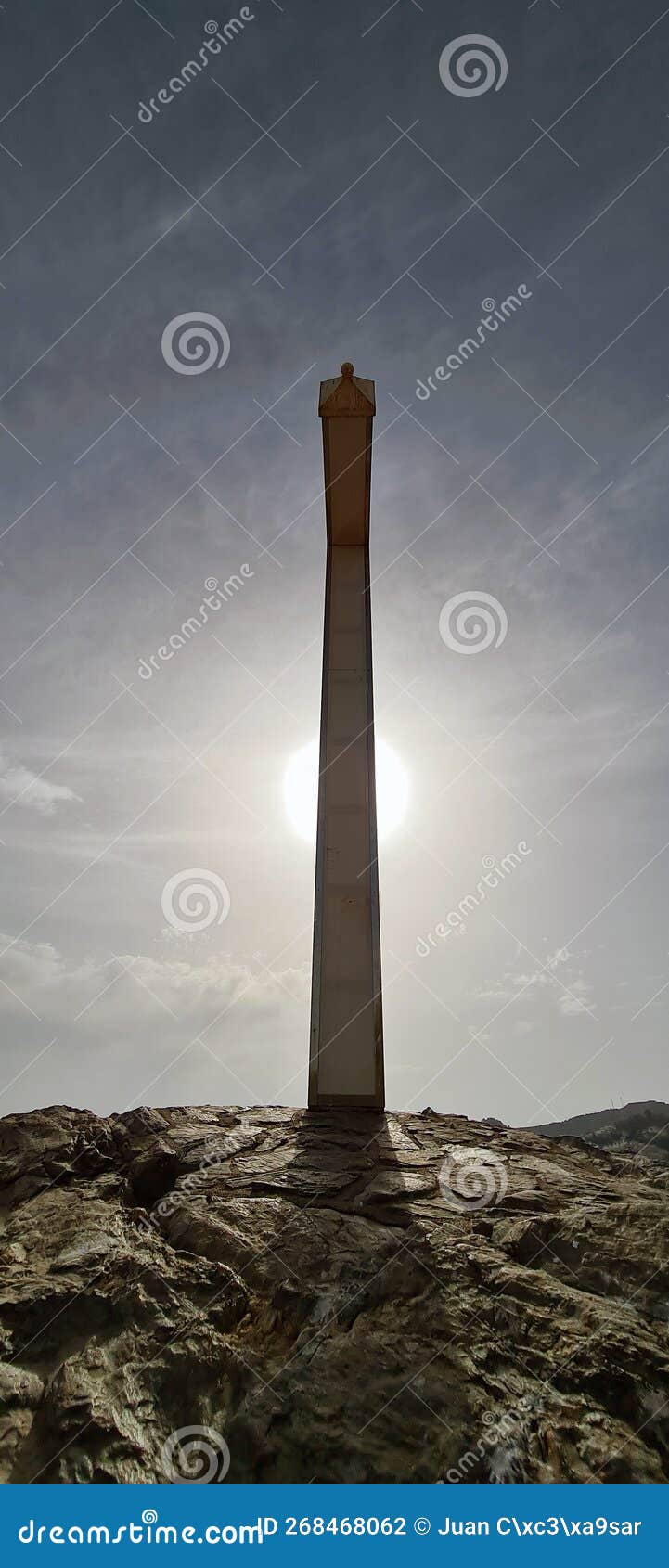 Side View of a Cross on the Side of a Mountain Stock Photo - Image of ...
