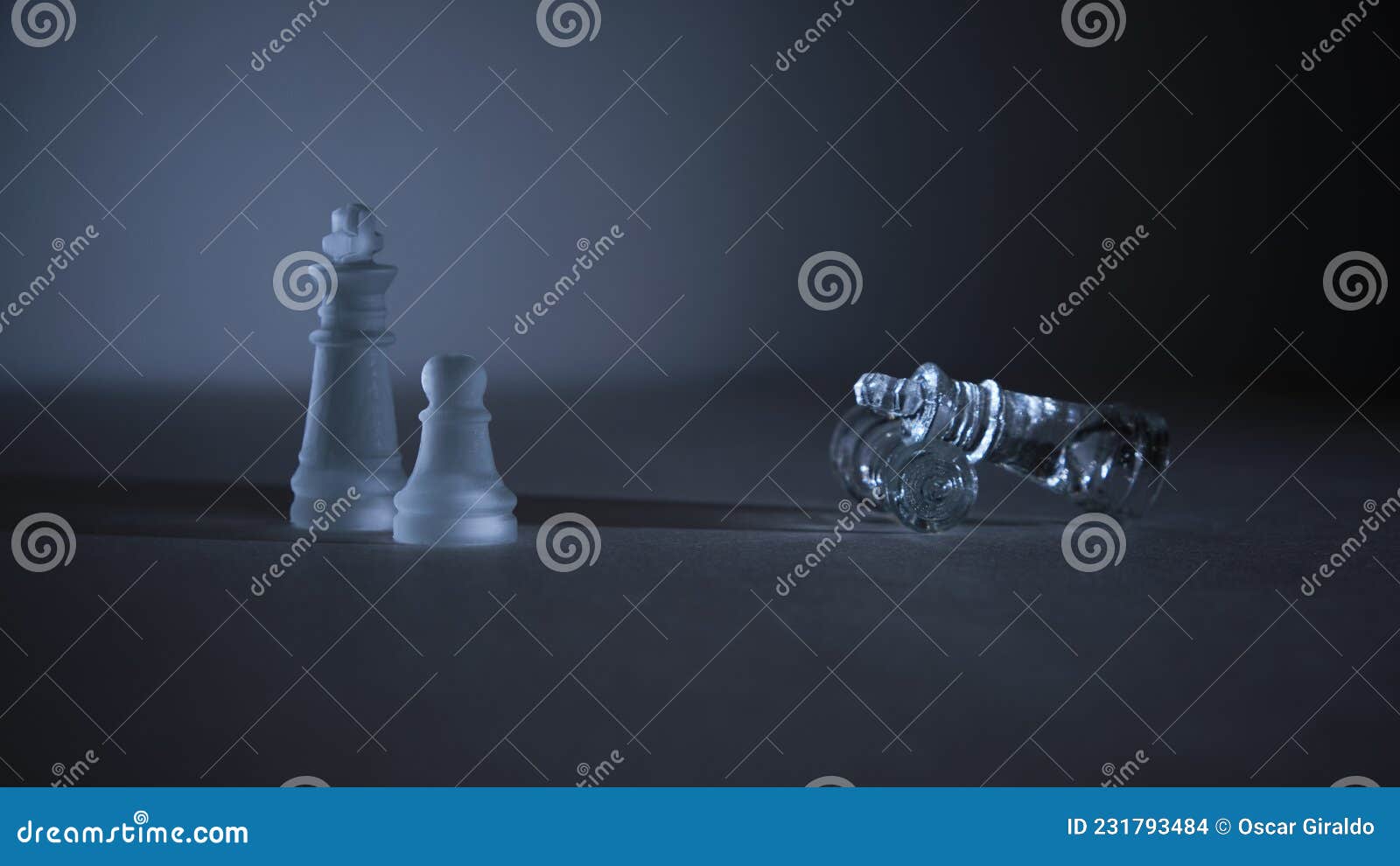 Side View of Crystal Chess King and Pawn in Front of Defeated Enemies ...