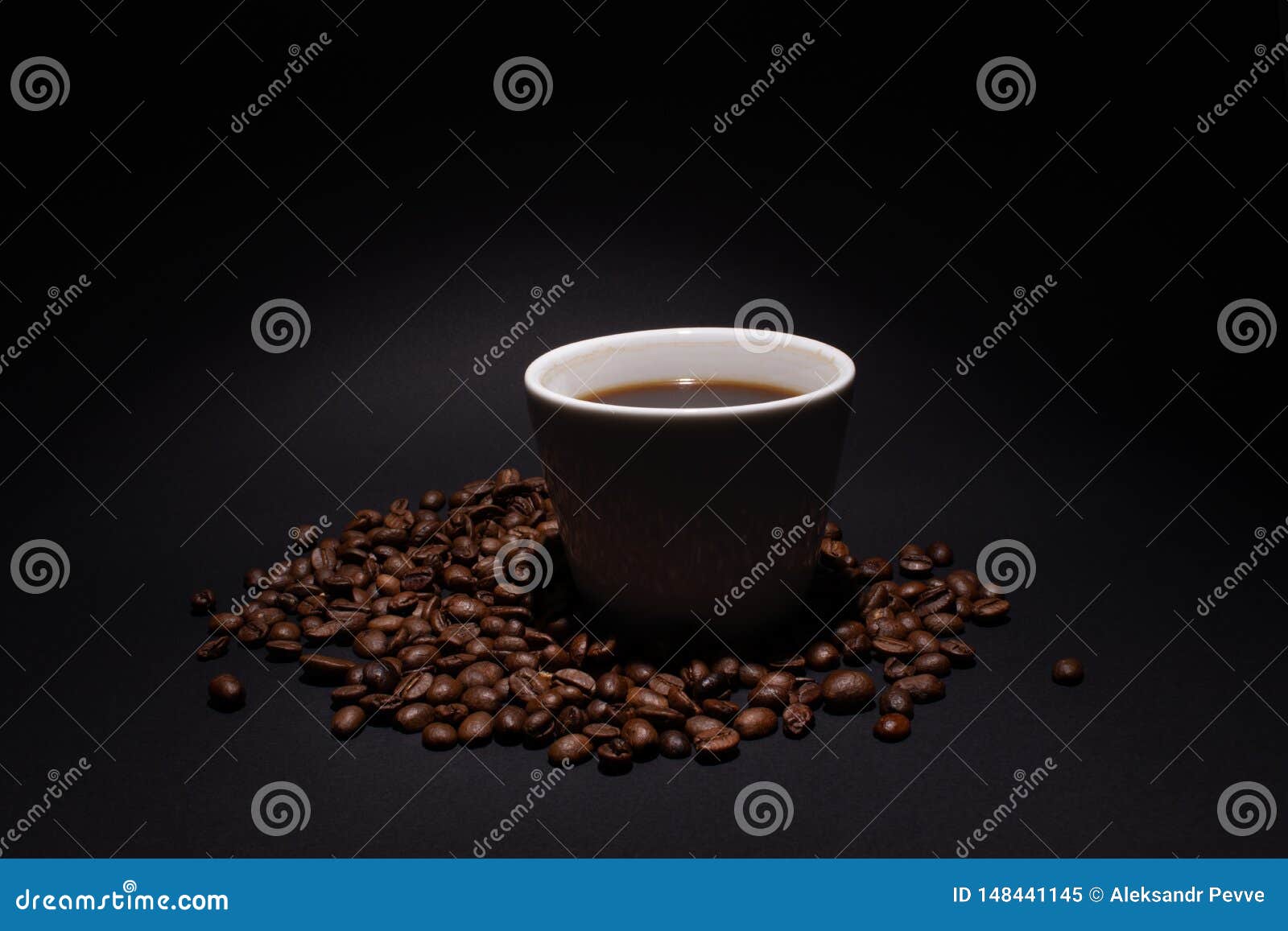 Side View of a Cup with Coffee and Coffee Beans with Top Lighting Stock ...