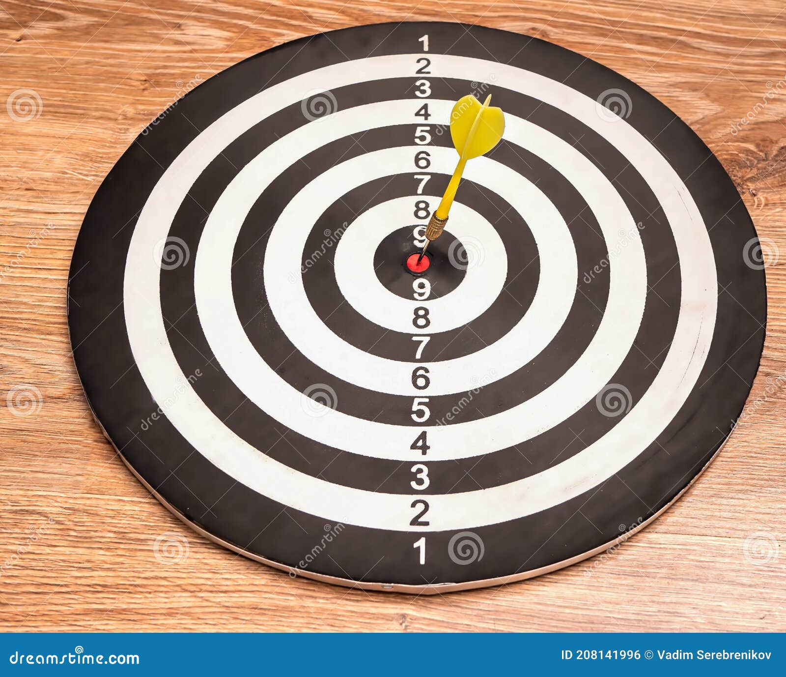 Side View of a Dartboard with a Dart in the Bull`s Eye. Stock Photo ...