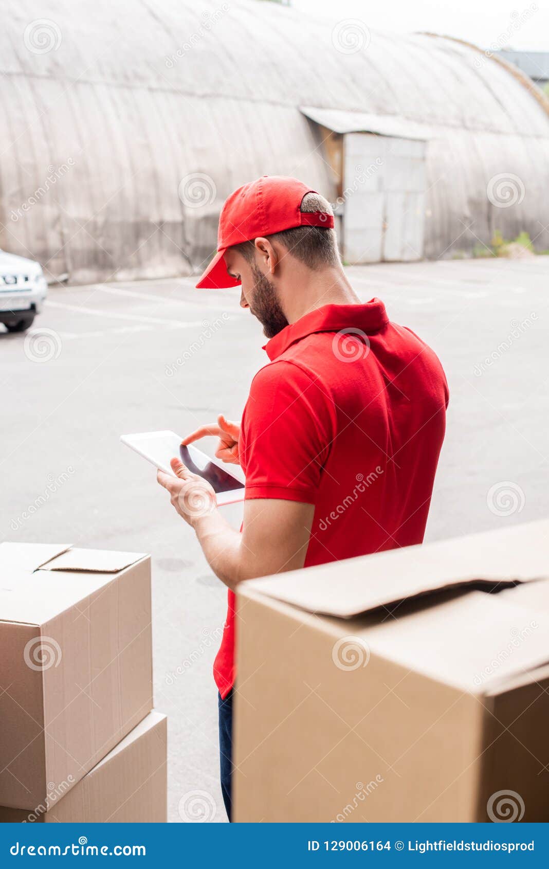 Side view of delivery man stock photo. Image of alone - 129006164