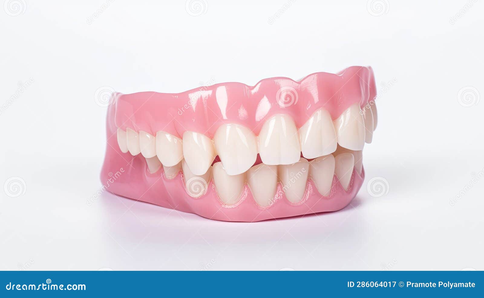 A Side View of Dentures or False Teeth Isolate on a White Background ...