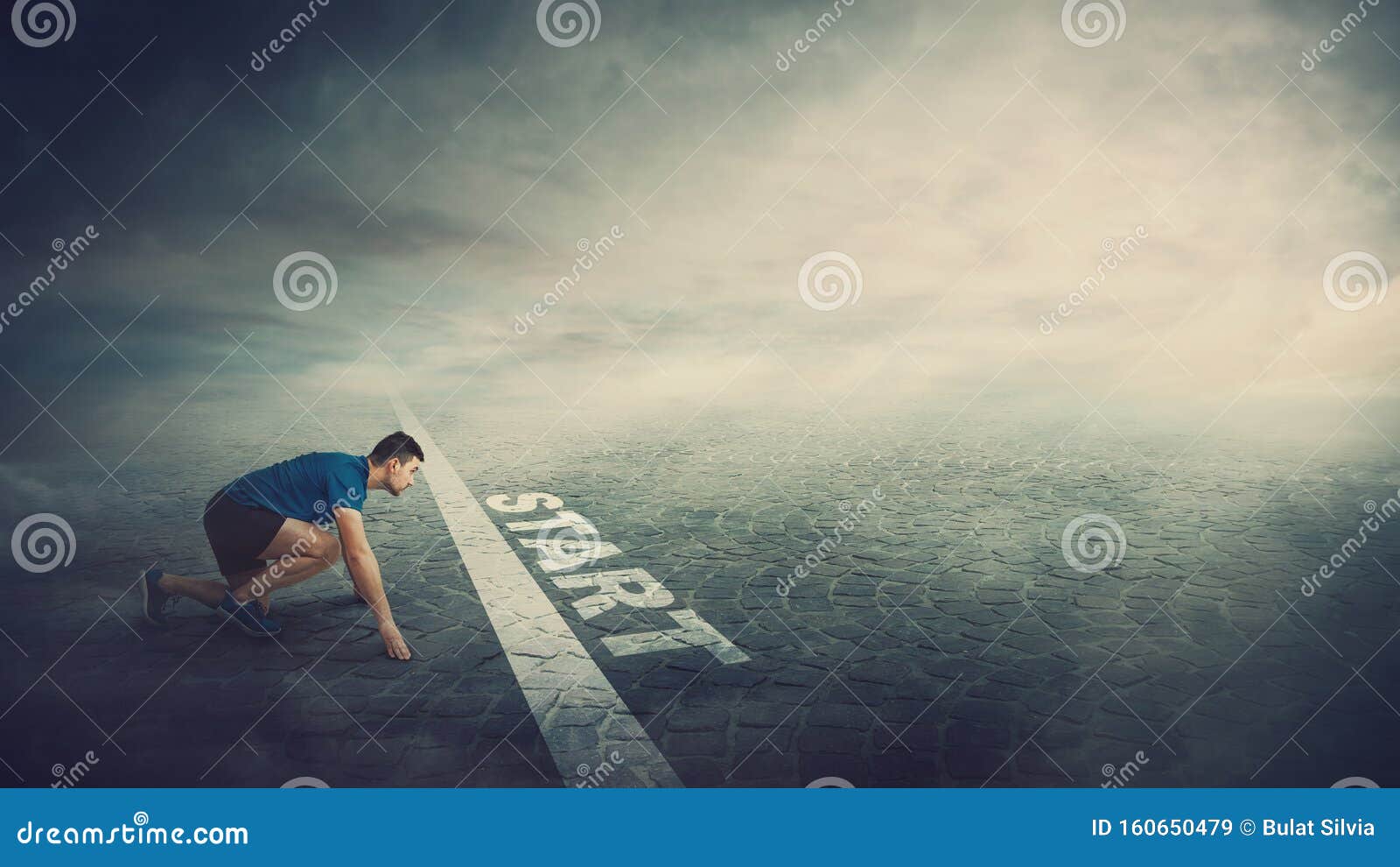 Side View Of Determined Man Sprinter Standing In Running Position, At ...