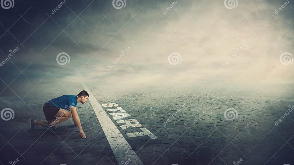 Side View of Determined Man Sprinter Standing in Running Position, at ...