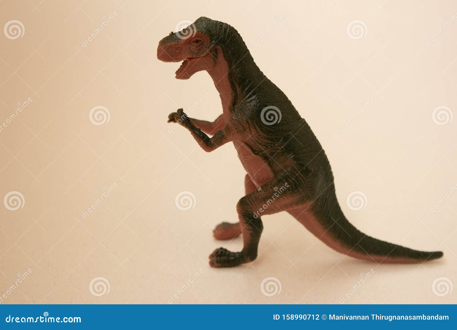 Side View of Dinosaur Toy on White Background Stock Photo - Image of ...