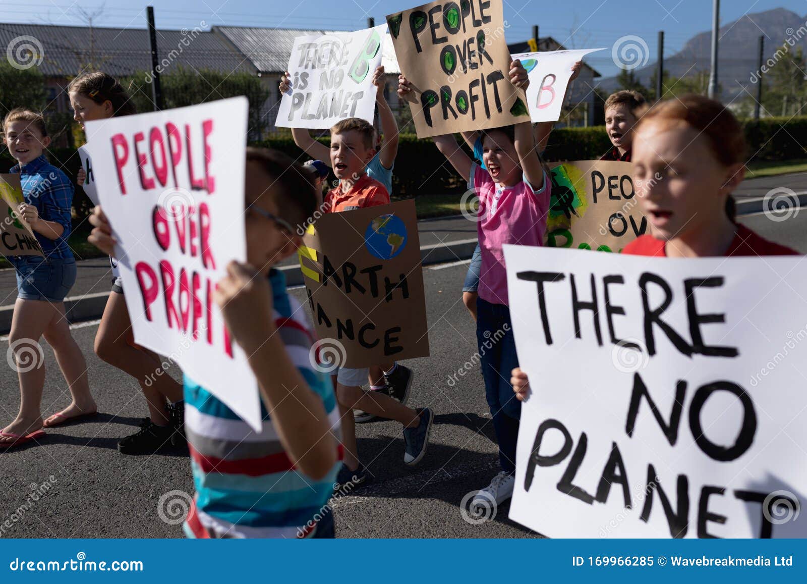 Group of Elementary School Pupils Walking on a Protest March Stock ...