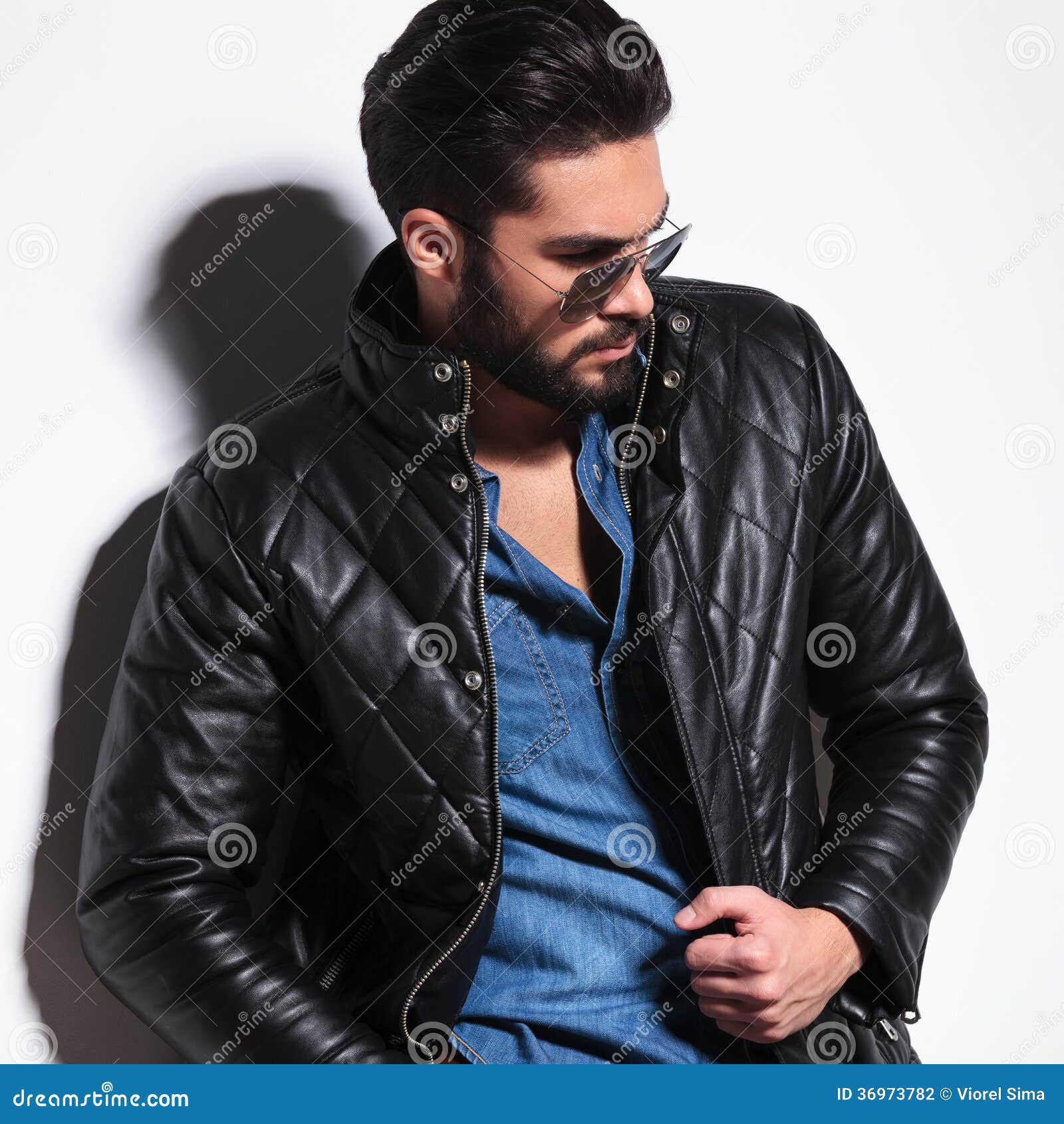 Side View of a Dramatic Fashion Male Model Posing Stock Photo - Image ...