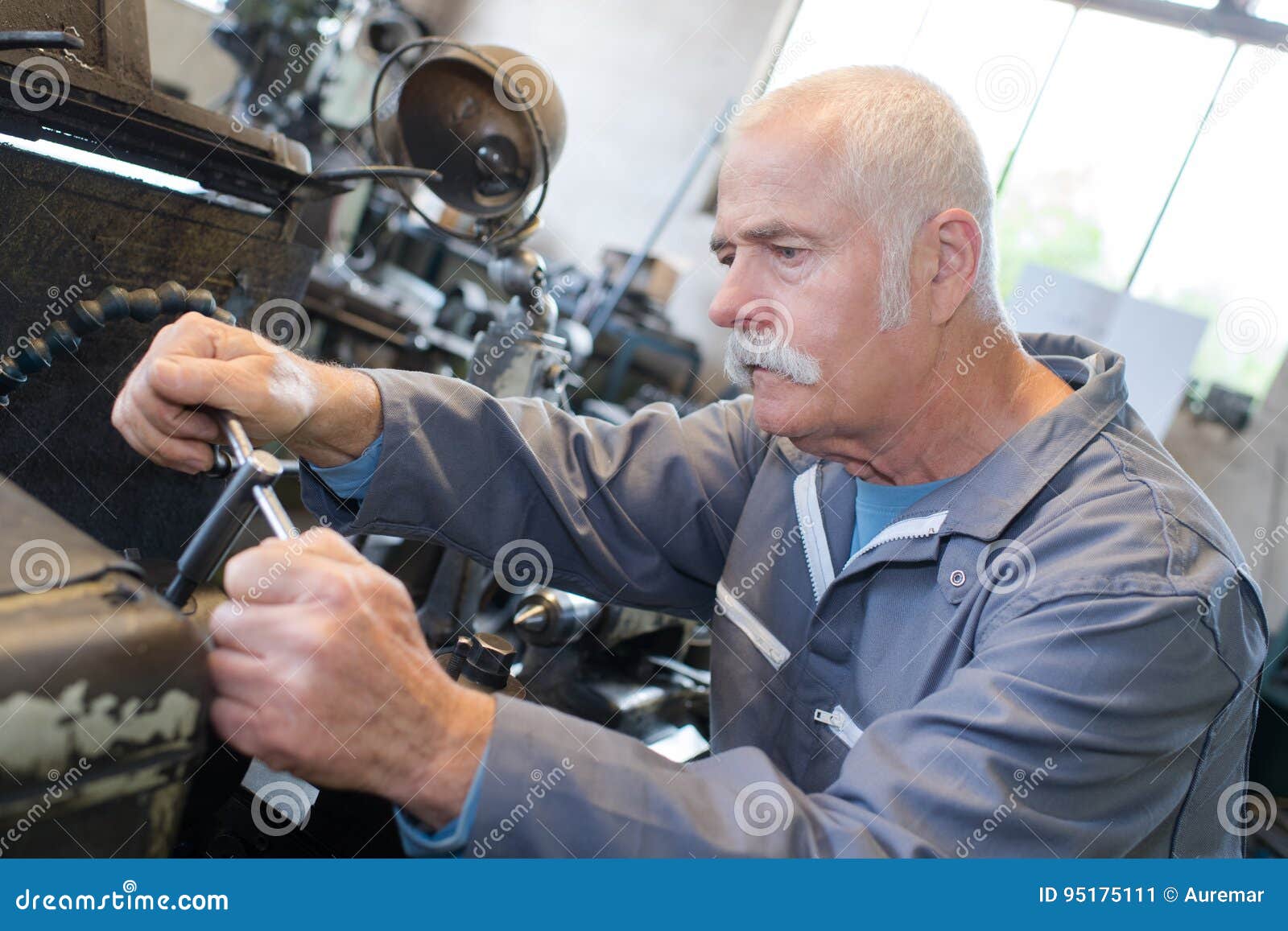 Side View Elderly Man Working at Table in Garage Stock Image - Image of ...