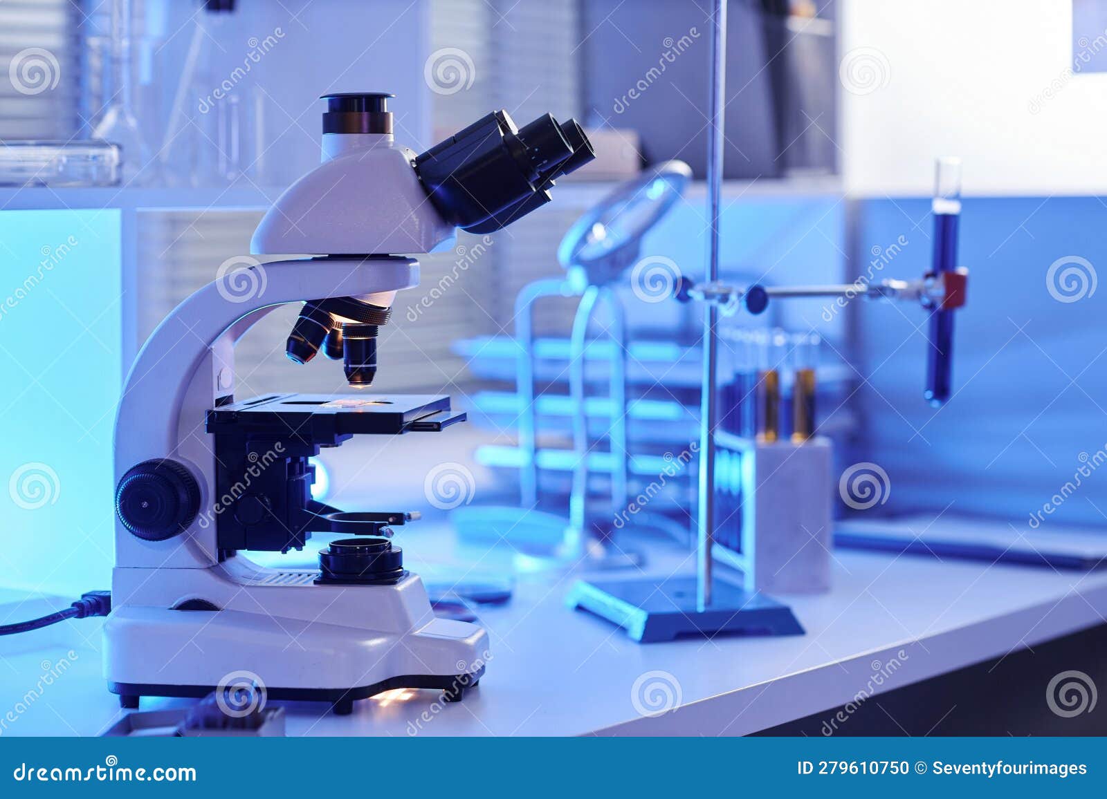 Side View Electronic Microscope on Laboratory Workstation in Neon Light ...