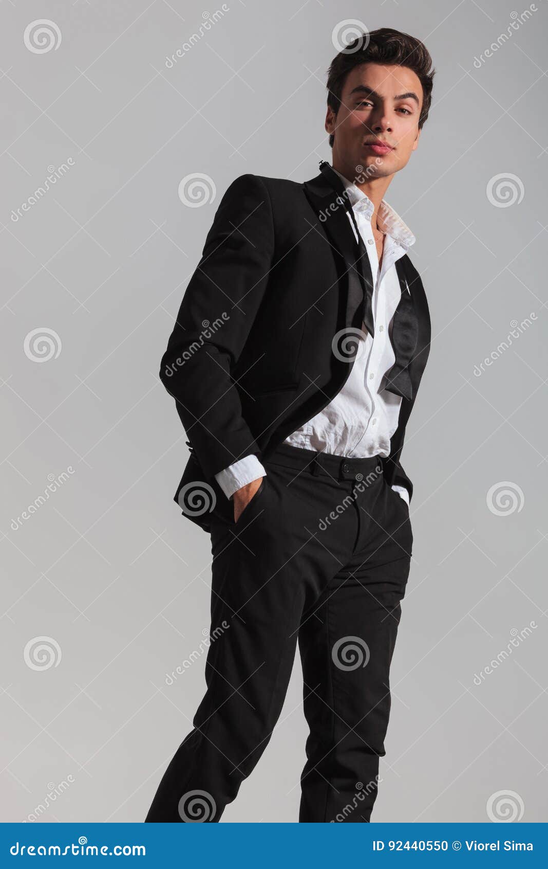 Side View of an Elegant Man in Tuxedo Walking Stock Photo - Image of ...