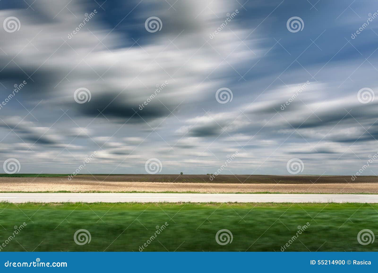 Side View on an Empty Asphalt Road in Blurred Motion Stock Photo ...