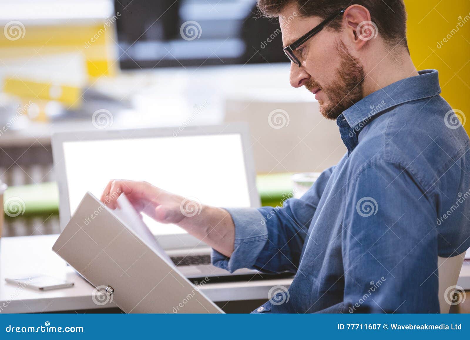 Side View of Executive Reading Documents at Office Stock Image - Image ...