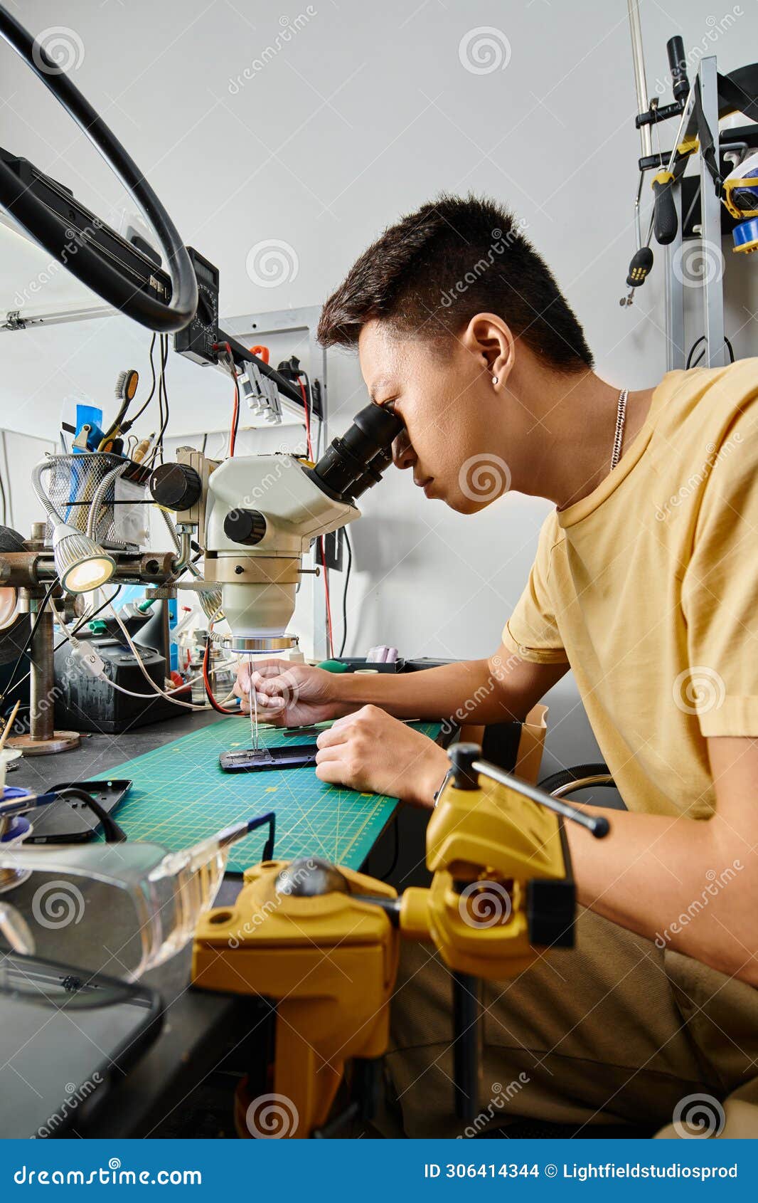 Side View of Experienced Asian Repairman Stock Photo - Image of ...