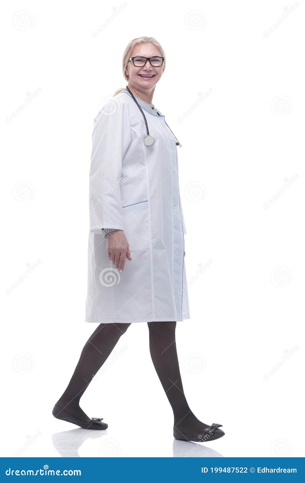Side View. Experienced Female Doctor Stepping Forward Stock Photo ...