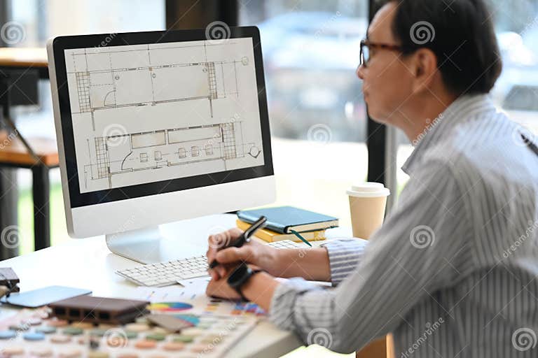 Side View of Experienced Senior Interior Designer Working at Creative ...